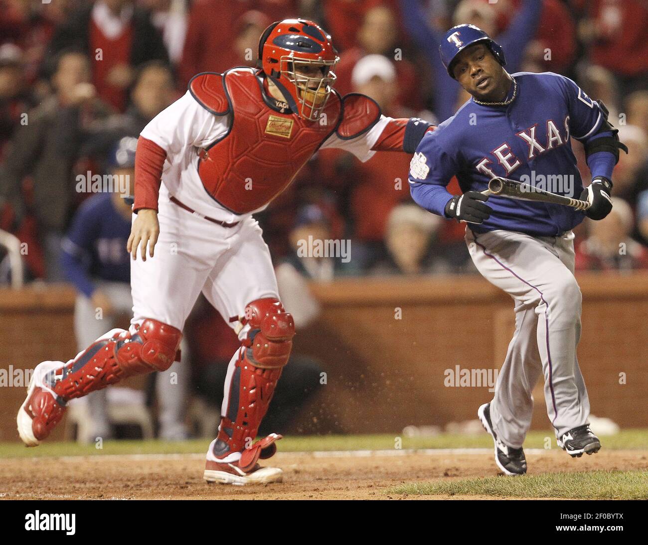 St. Louis Cardinals catcher Yadier Molina tags out Texas Rangers second ...