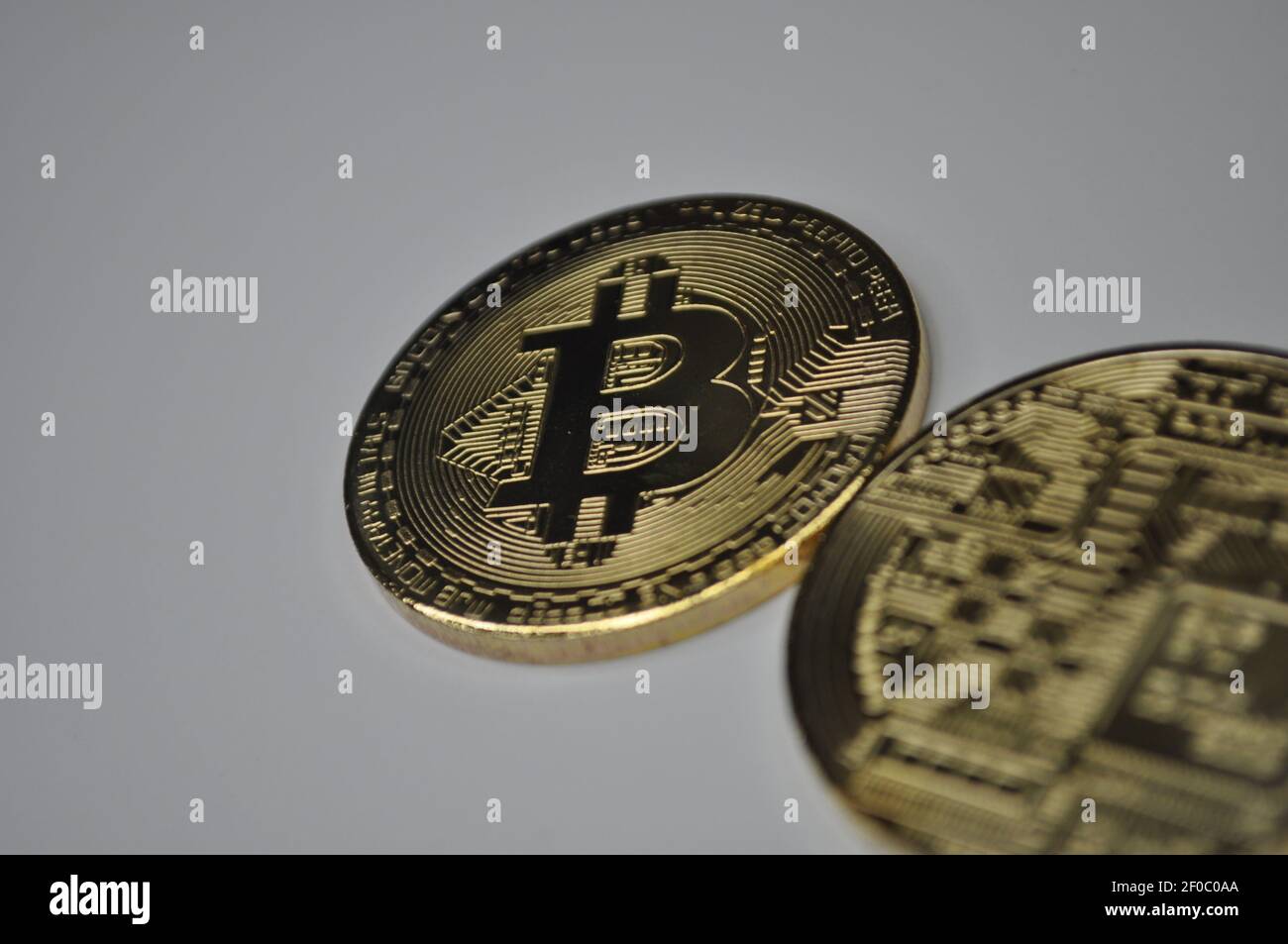 Macro view of gold and silver color shiny coins with Bitcoin symbol ...