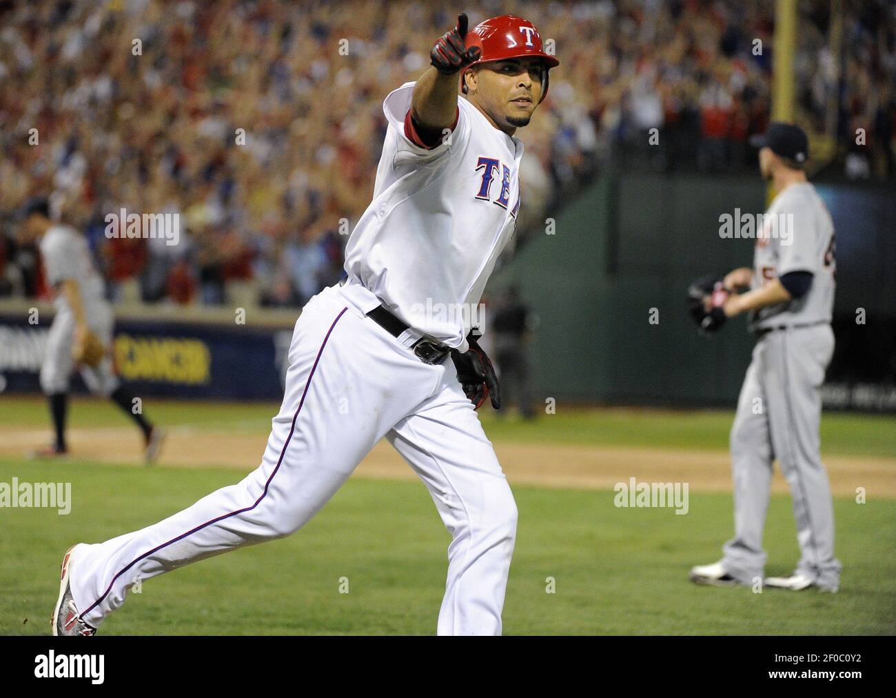 Texas Rangers Nelson Cruz rounds the bases after his walk-off grand ...