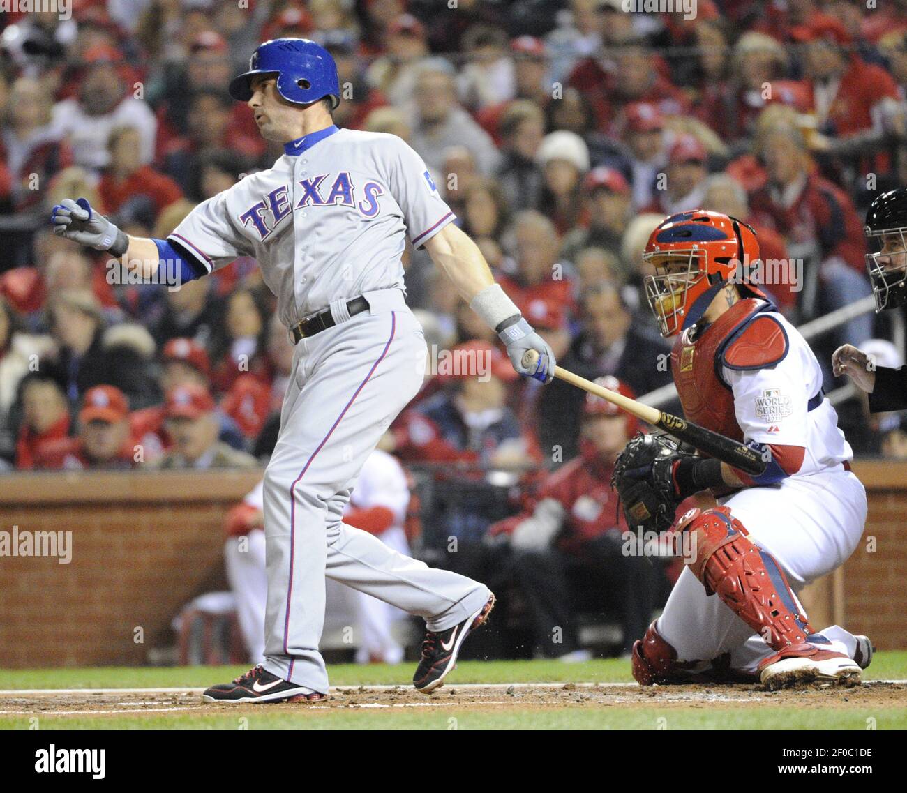 Texas Rangers' Michael Young strikes out in the second inning against ...