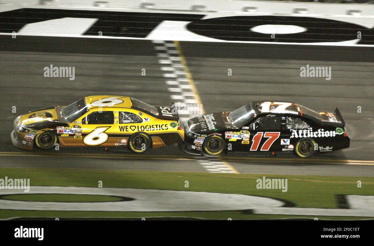 David Ragan (6) crosses the finish line to win, just in front of Matt ...