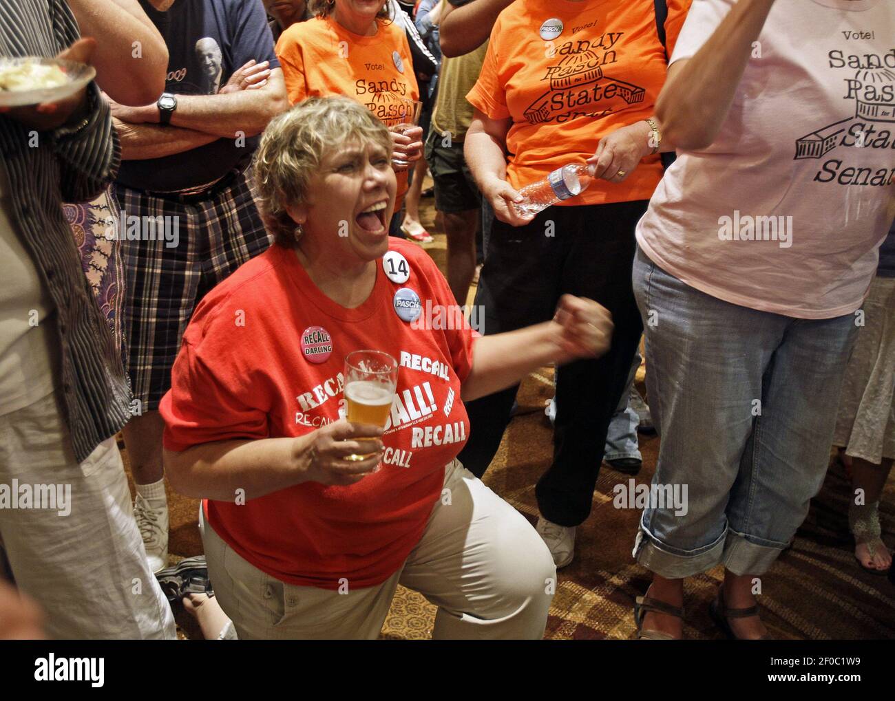 Georgene Voutila cheers an early return from another recall election at ...
