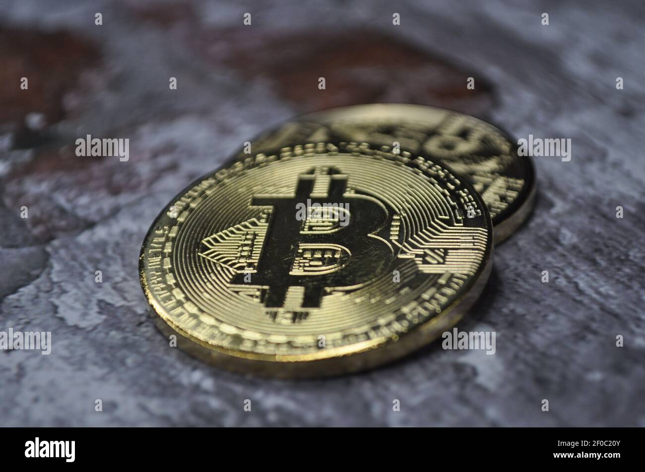 Macro view of gold and silver color shiny coins with Bitcoin symbol ...
