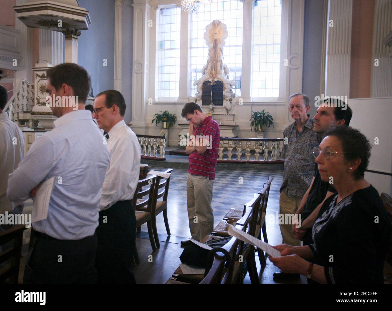 Church goers attend Sunday morning service at St. Paul's Chapel, August ...