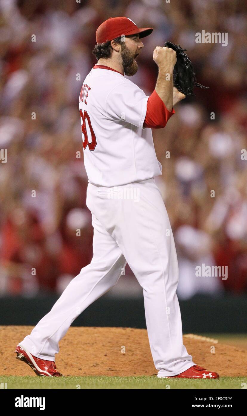 St. Louis Cardinals pitcher Jason Motte reacts after securing the final ...