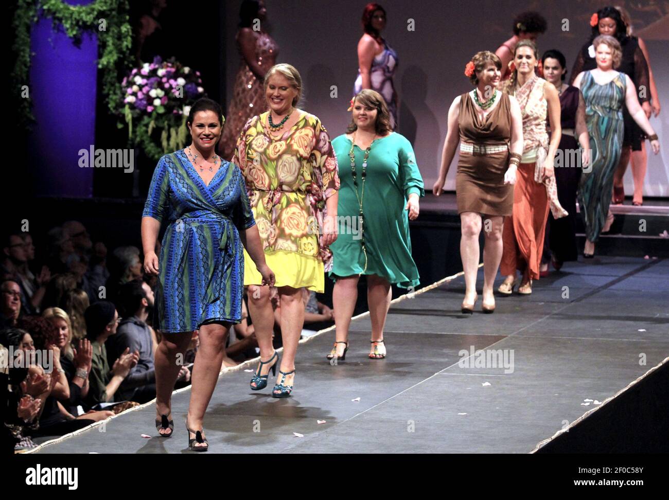 Models wearing Jill Alexander's designs strut their stuff on the runway ...