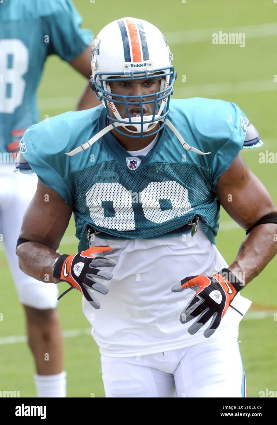 The Miami Dolphins' Jason Taylor practices during training camp in ...