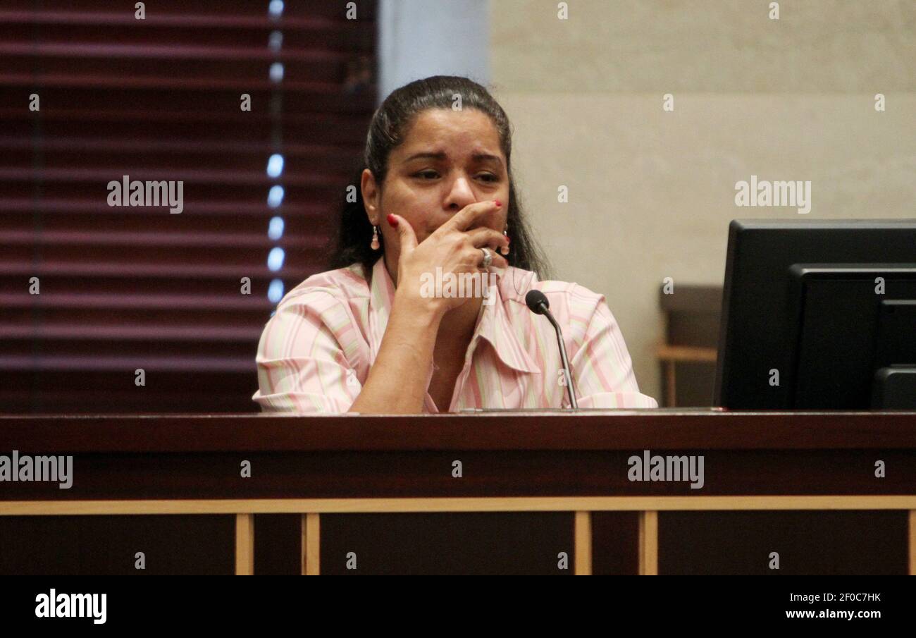 Krystal Holloway, also known as River Cruz, reacts when questioned ...