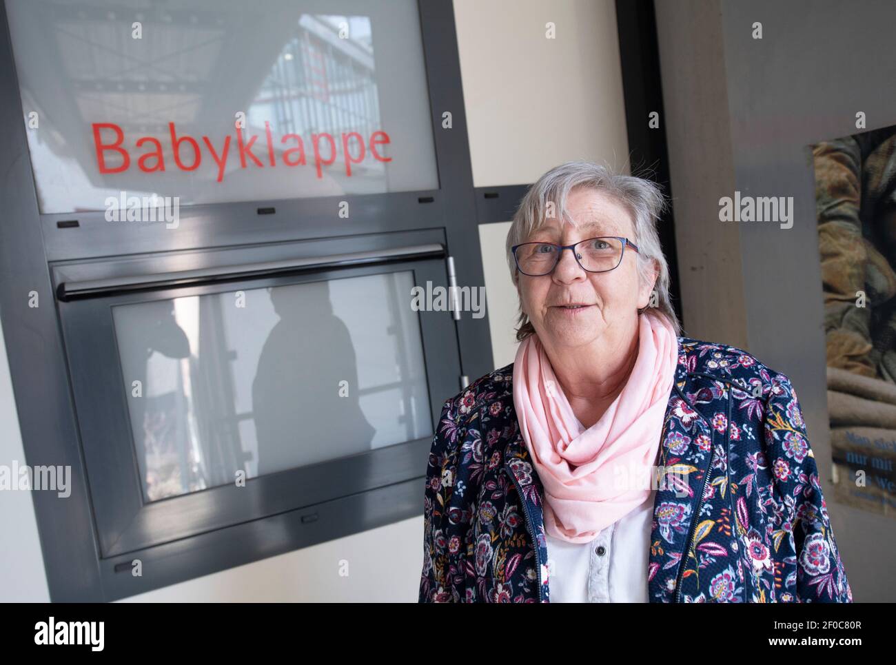 Hanau, Germany. 25th Feb, 2021. Jutta Berg stands in front of the baby ...