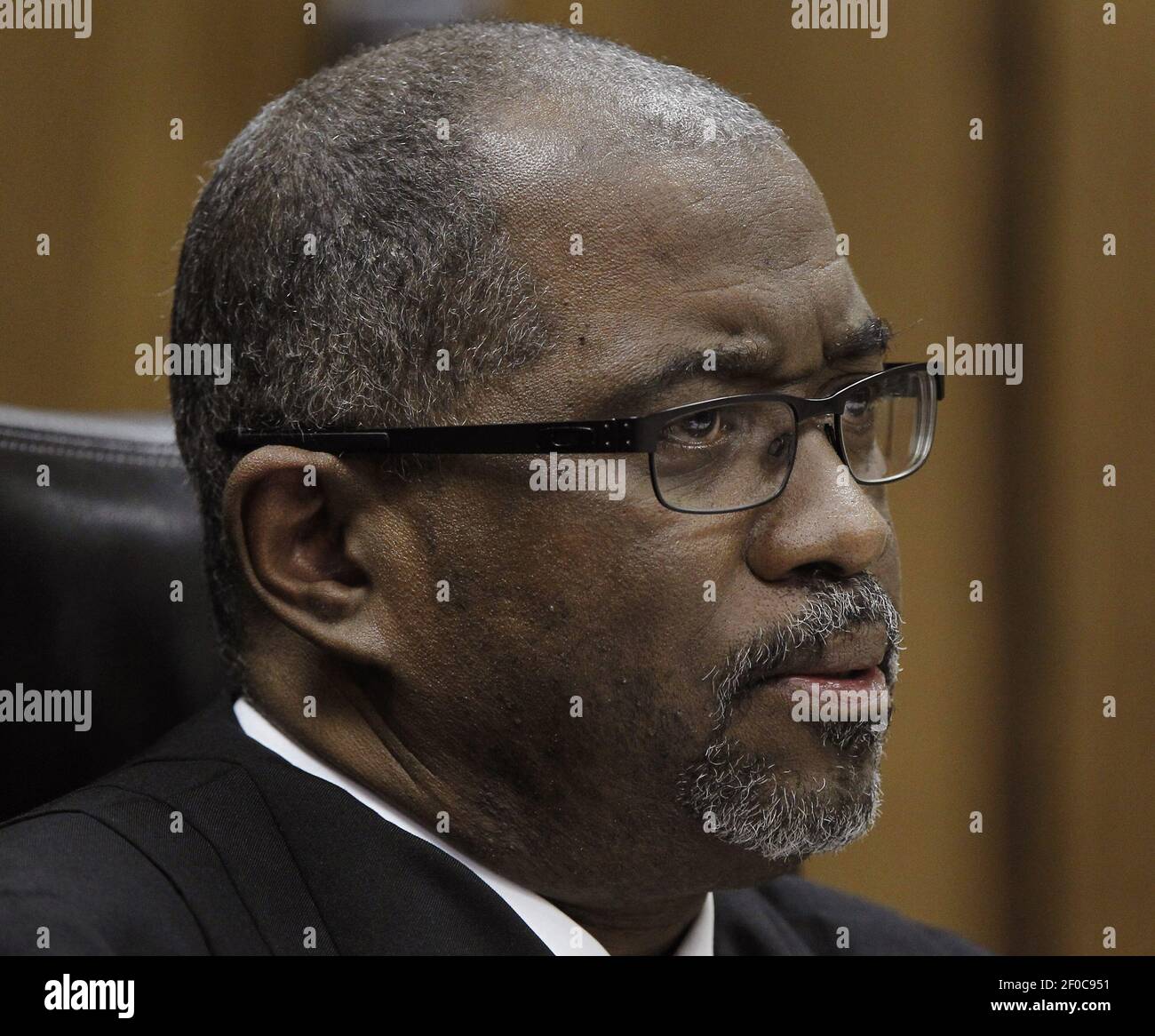 Judge Orlando Hudson frowns as he listens to Durham DA Tracey Cline ...