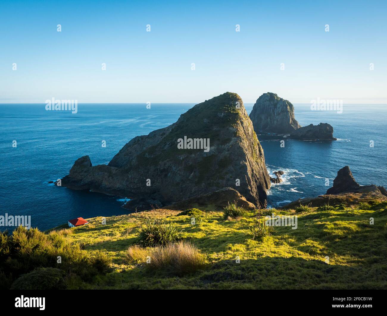 Cape Brett Lighthouse and Cape Brett Hut in Rawhiti New Zealand Stock ...