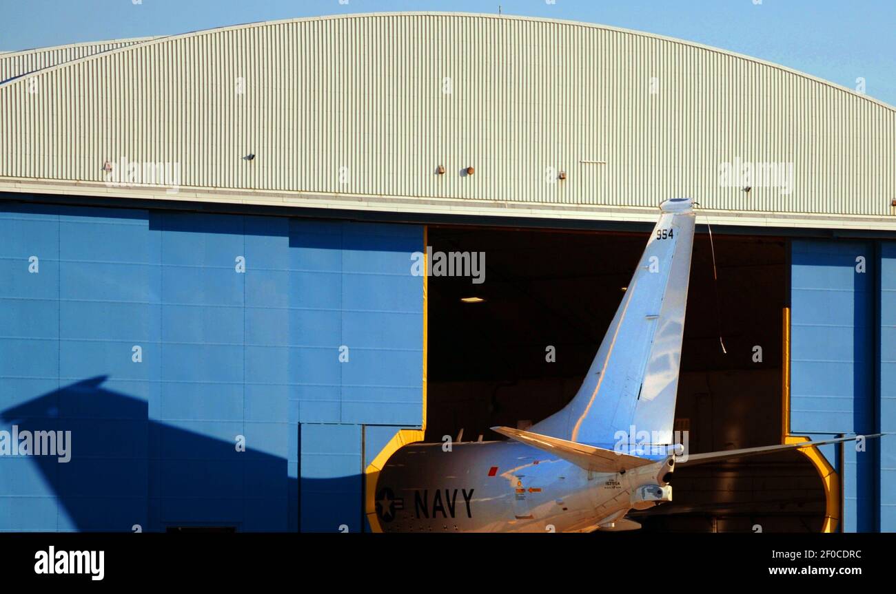 A P-8 Poseidon aircraft is worked on in a hangar at Patuxent River ...