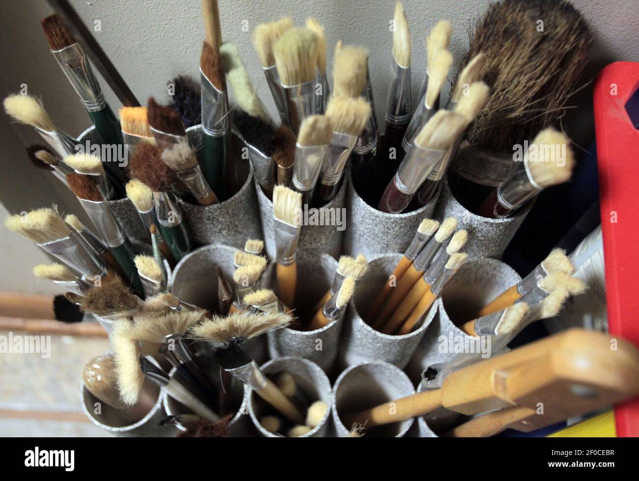 Paint brushes are kept at the ready at the eclectically-decorated home ...