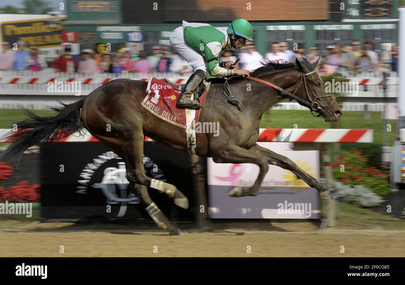 Royal Delta, ridden by Jose Lezcano, easily wins the 87th running of ...