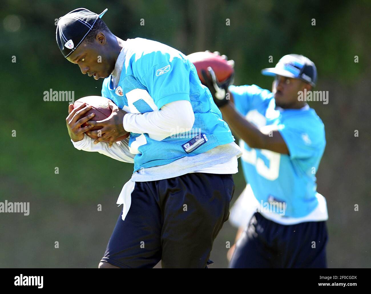 Chris Gamble, left, and Jordan Pugh of the Carolina Panthers run drills ...