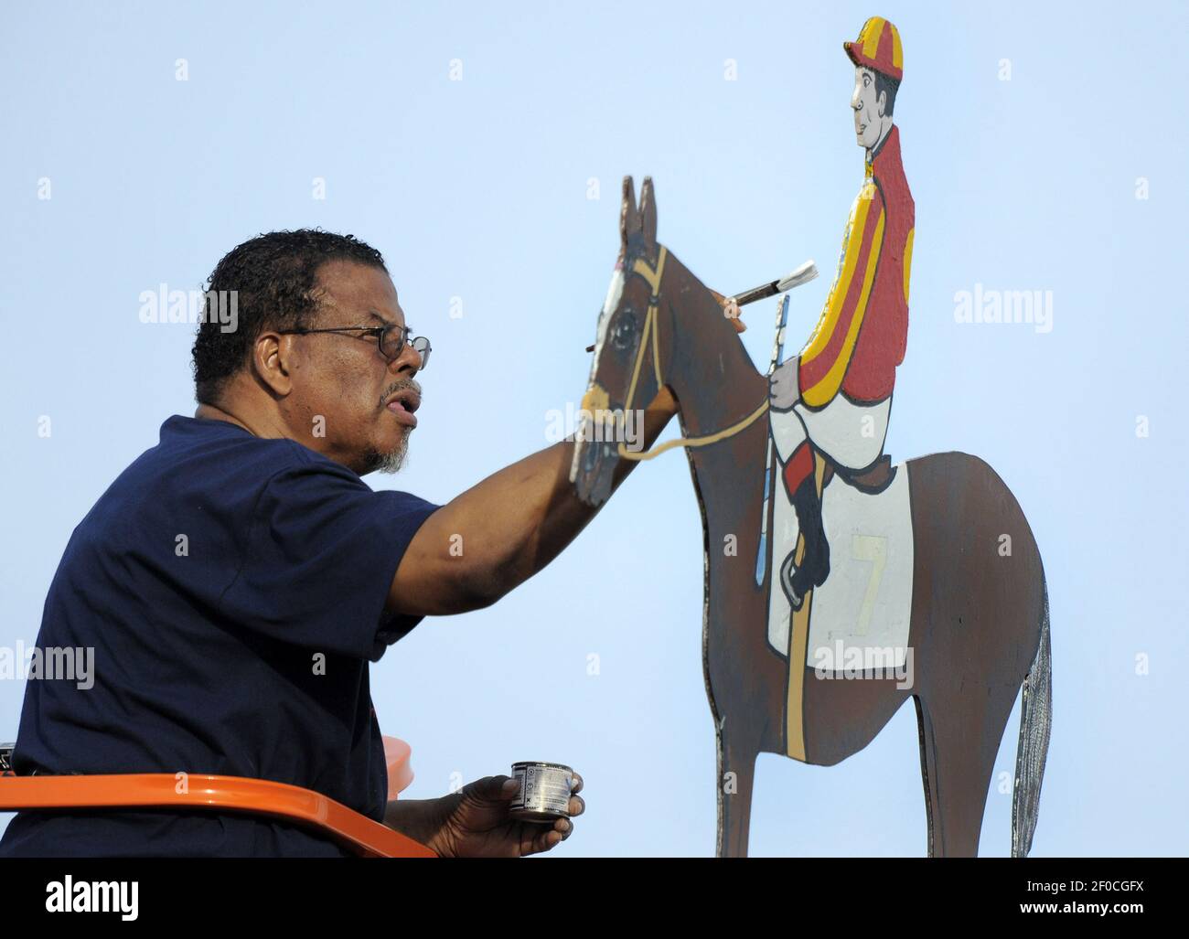 The winning jockey's colors are painted on the cupola in the winner's ...