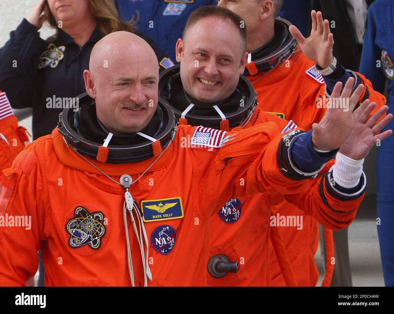 Space shuttle commander Mark Kelly, left, and astronaut Mike Fincke ...