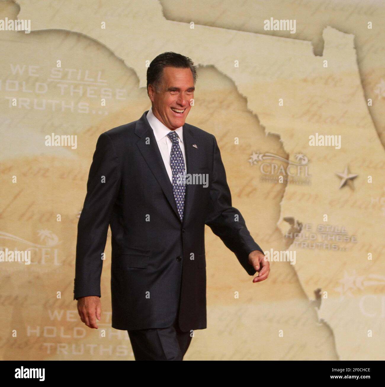 2012 Republican presidential candidate Mitt Romney arrives onstage at ...