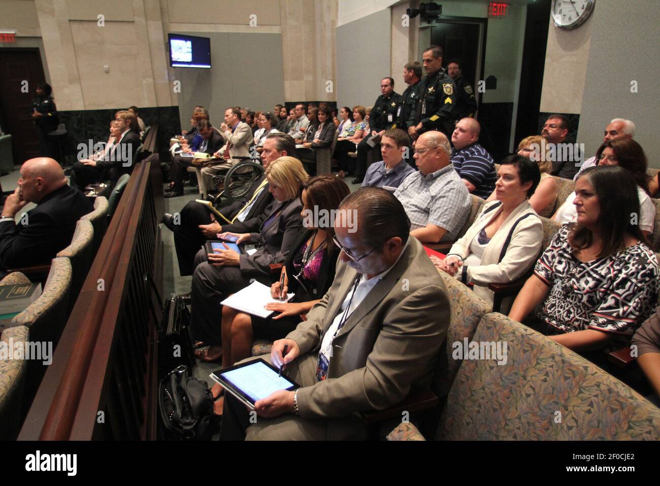 The spectators in Courtroom 23 at the Orange County Courthouse for the ...