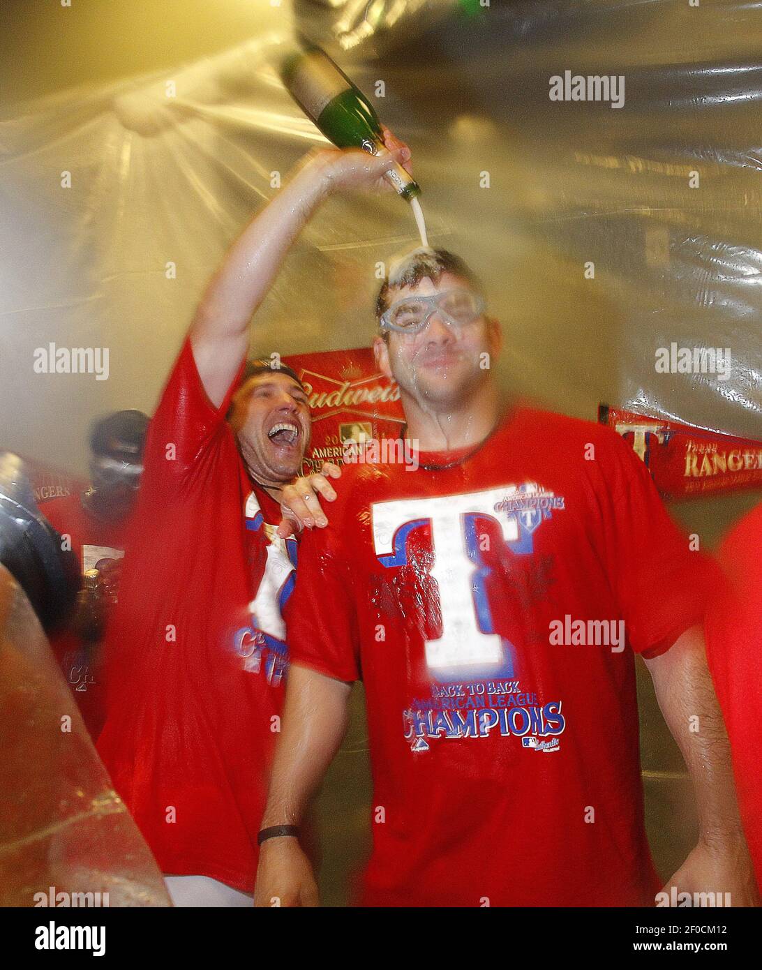 The Texas Rangers' Ian Kinsler and Mitch Moreland take a champagne ...