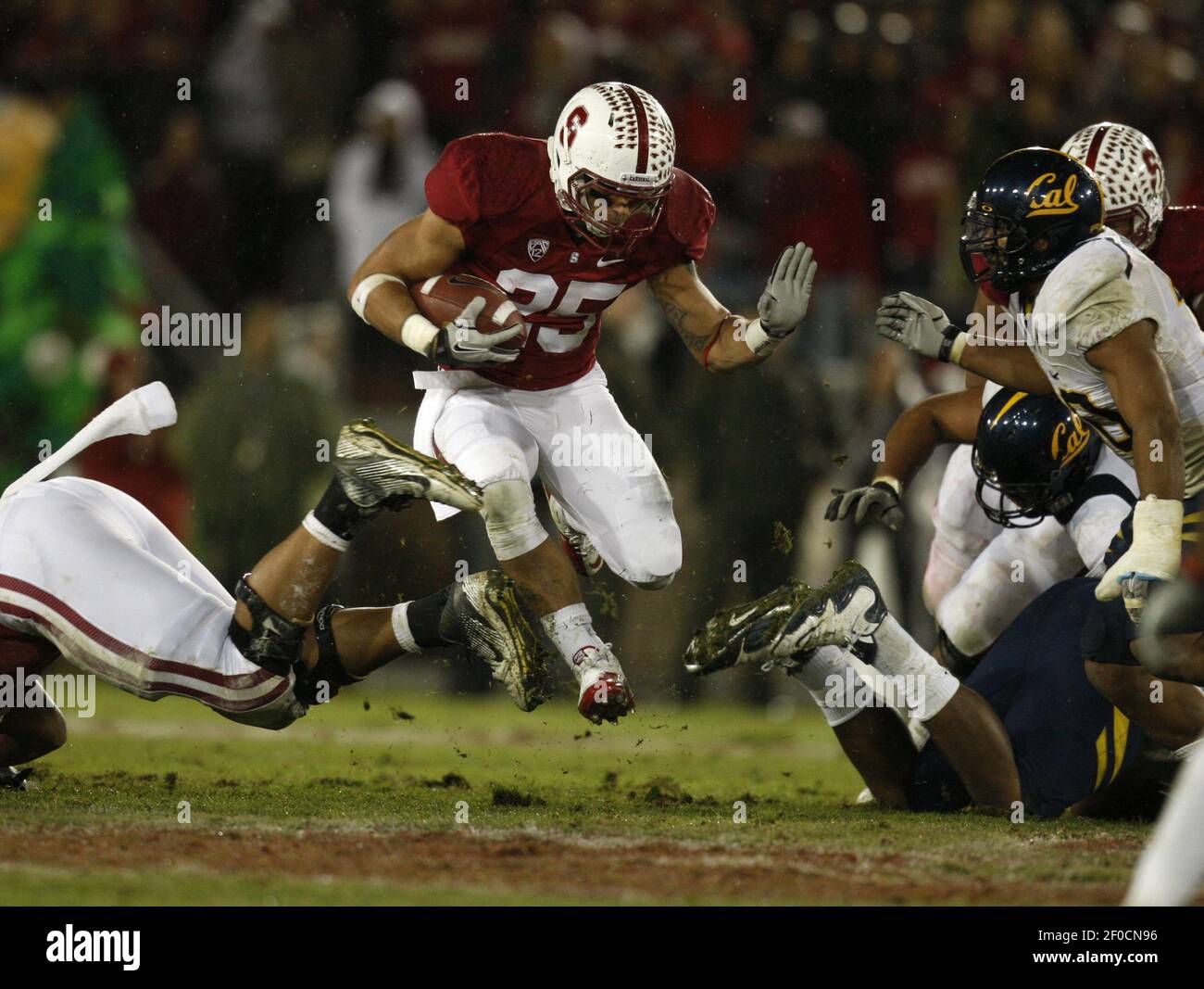 Stanford's Tyler Gaffney (25) runs against the California defense in ...