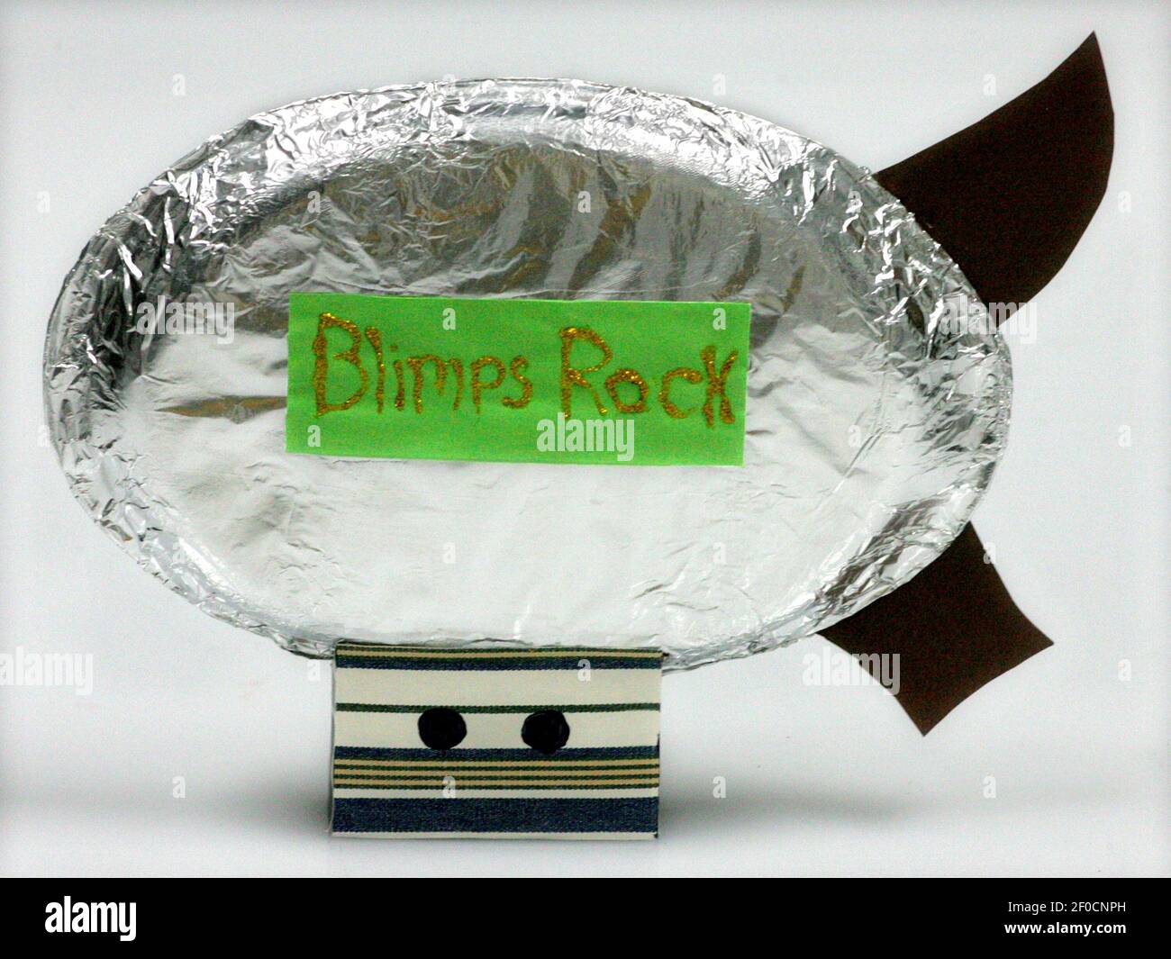 Paper plates wrapped with aluminum foil make a blimp craft project ...