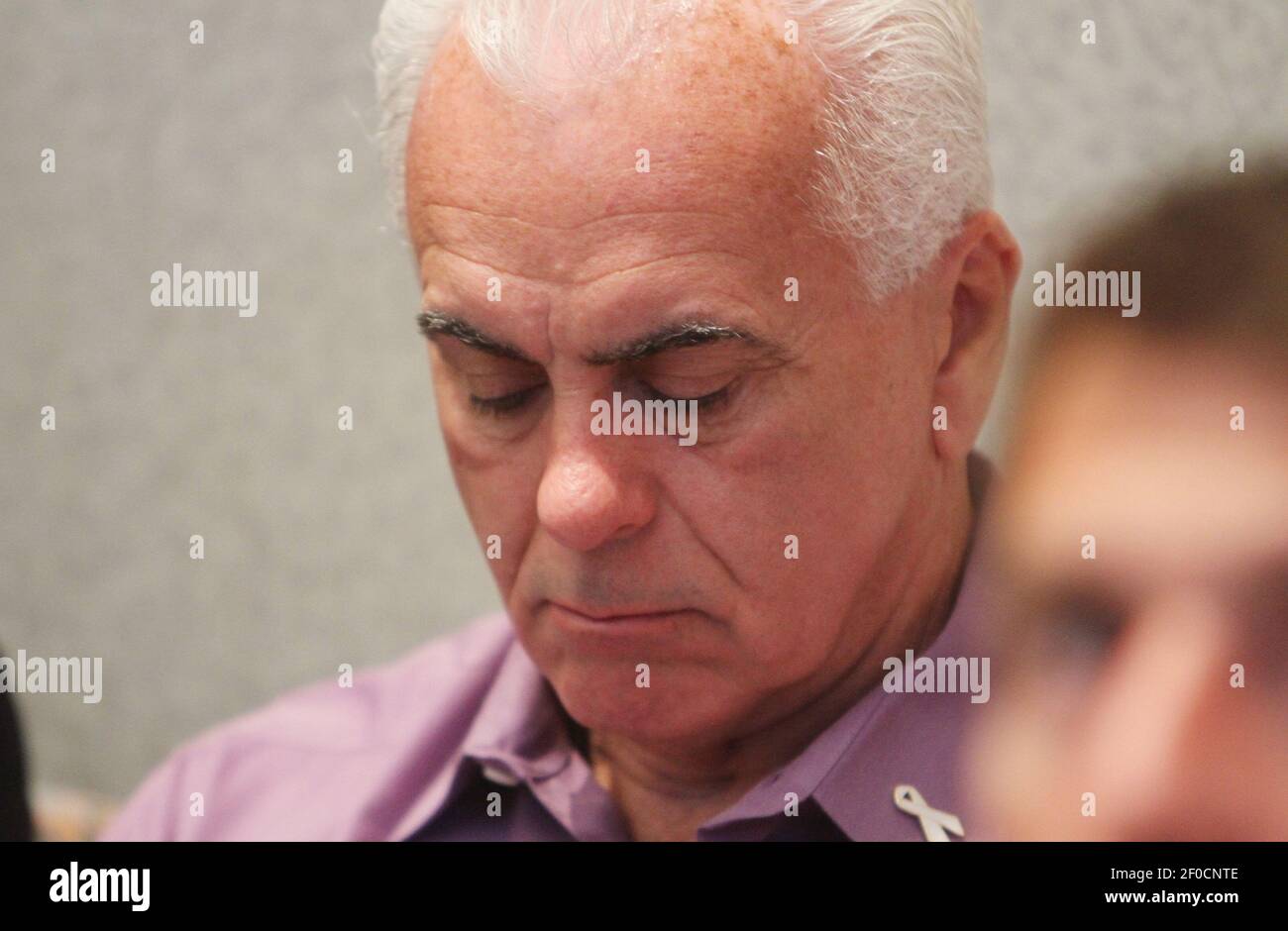 George Anthony looks away as evidence photos showing the skull of his ...