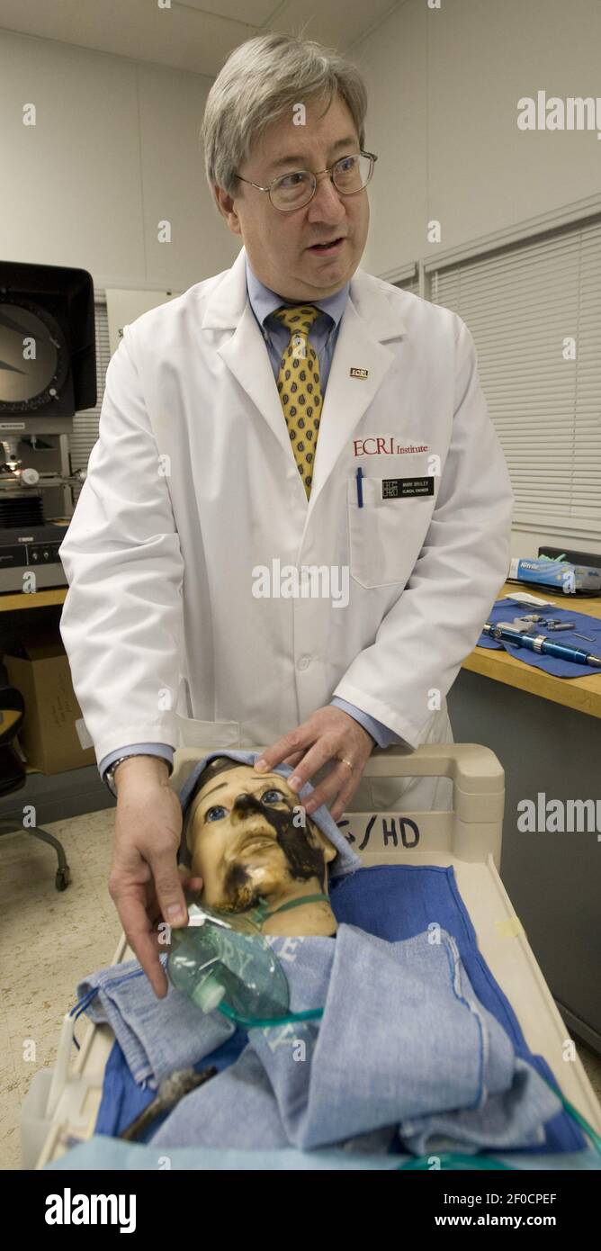 Mark Bruley, vice president of the nonprofit ECRI, uses a mannequin in ...