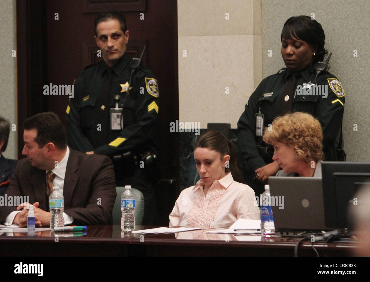 Casey Anthony sits at the defense table waiting for the jury to return ...