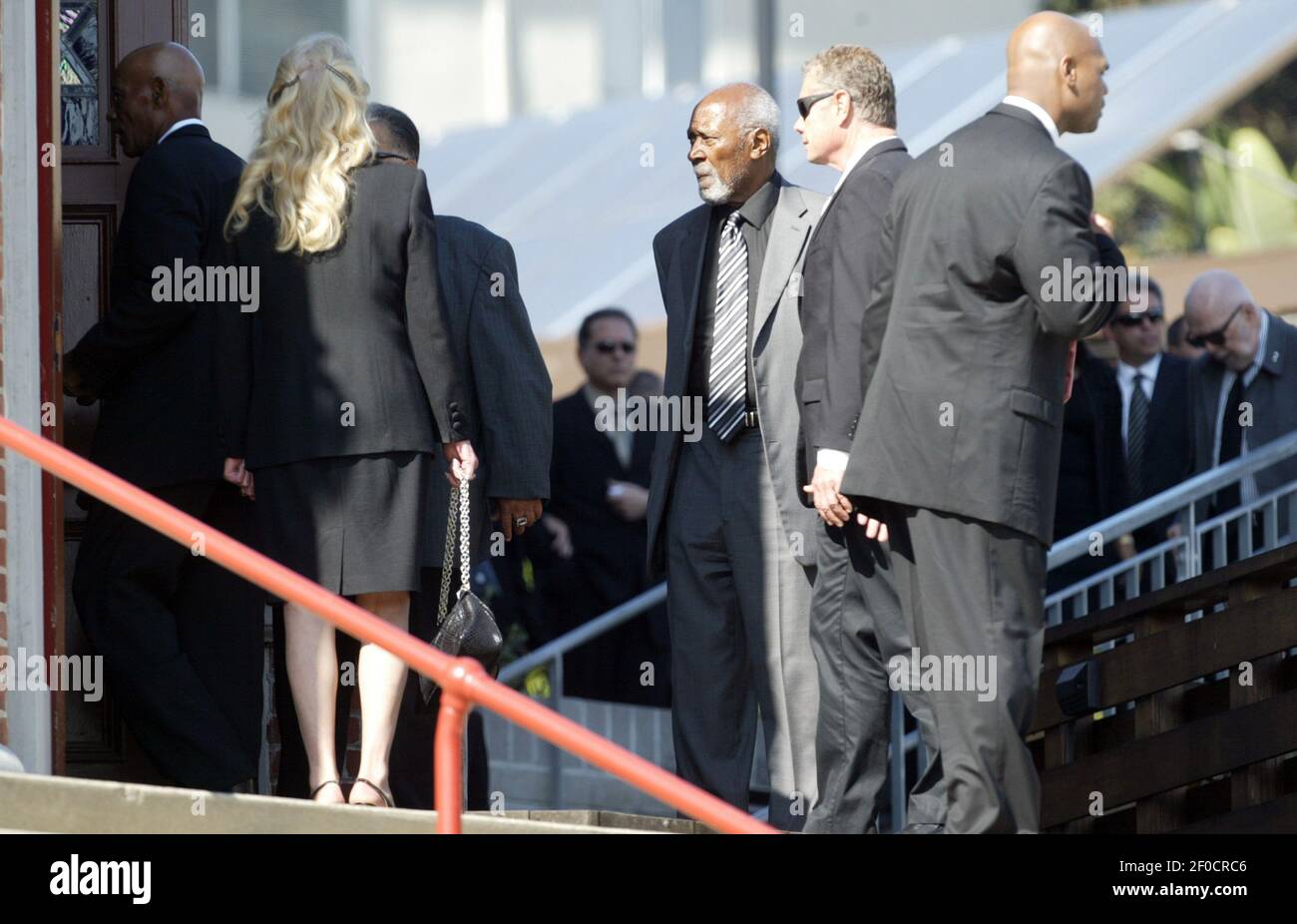 Friends and family arrive at Temple Beth Abraham in Oakland, California ...