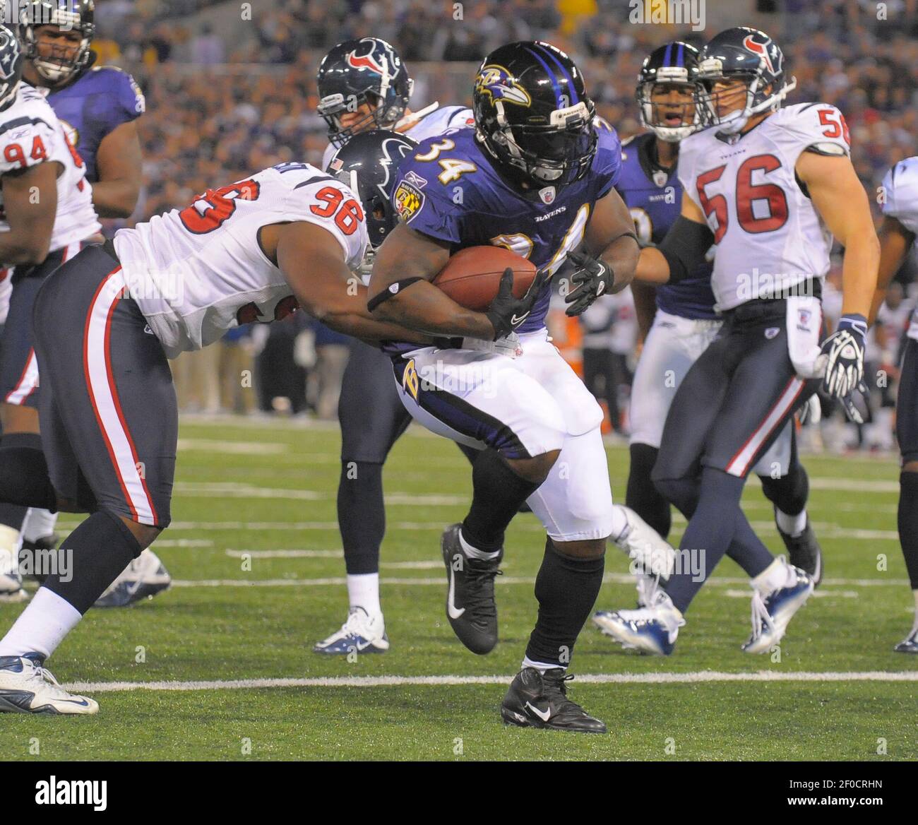 Baltimore Ravens running back Ricky Williams eludes Houston Texans ...