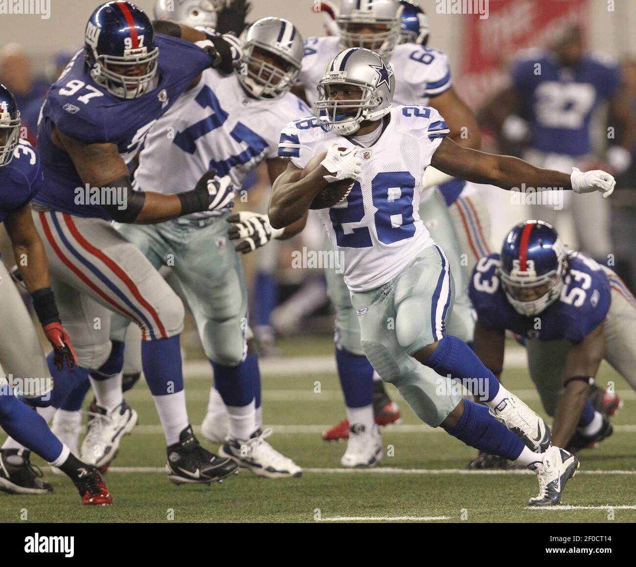 Dallas Cowboys running back Felix Jones (28) runs the ball against the ...