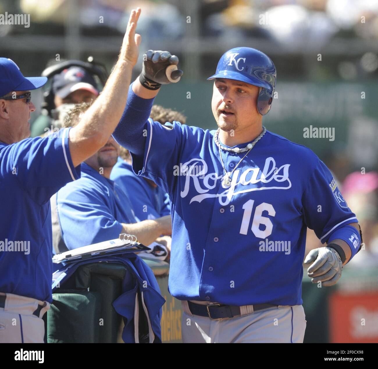 The Kansas City Royals' Billy Butler (16) celebrates with teammates ...