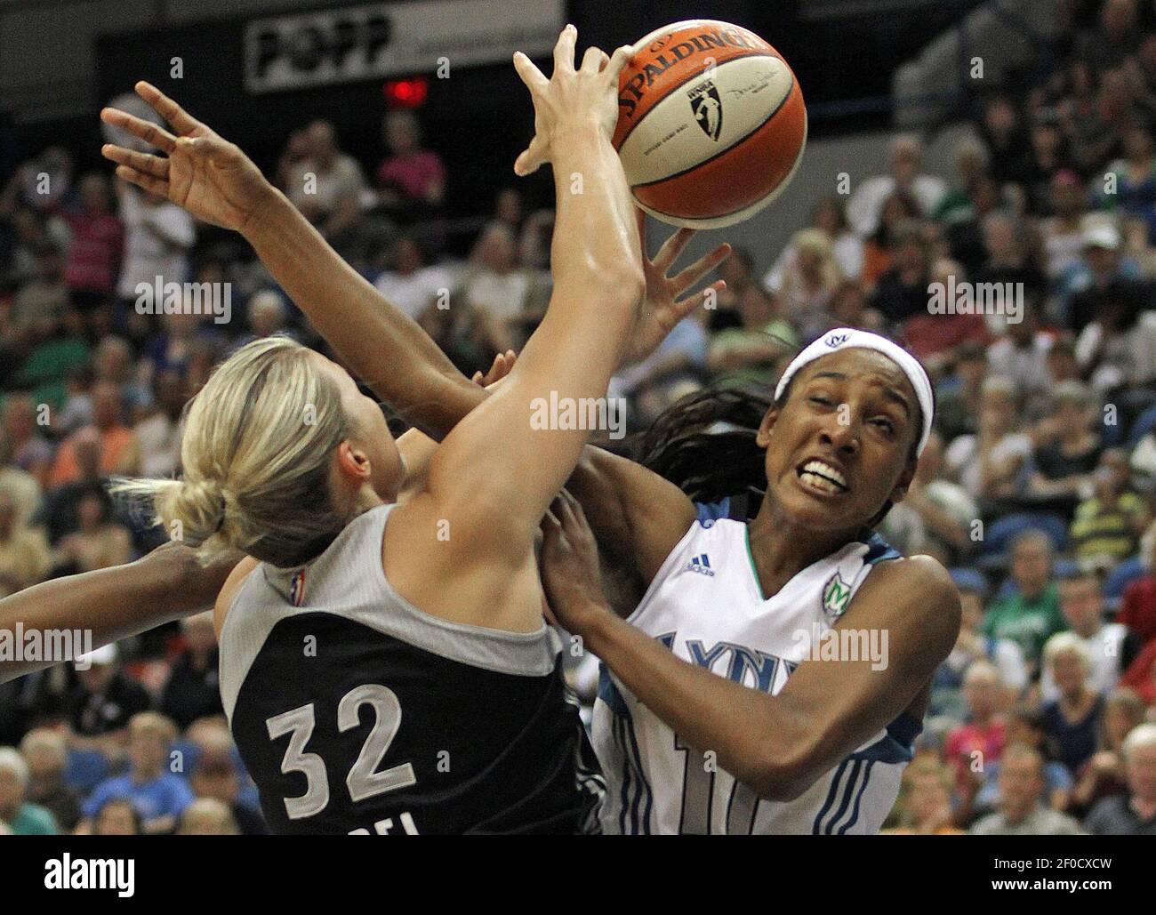 The San Antonio Silver Stars' Jayne Appel (32) and Minnesota Lynx's ...