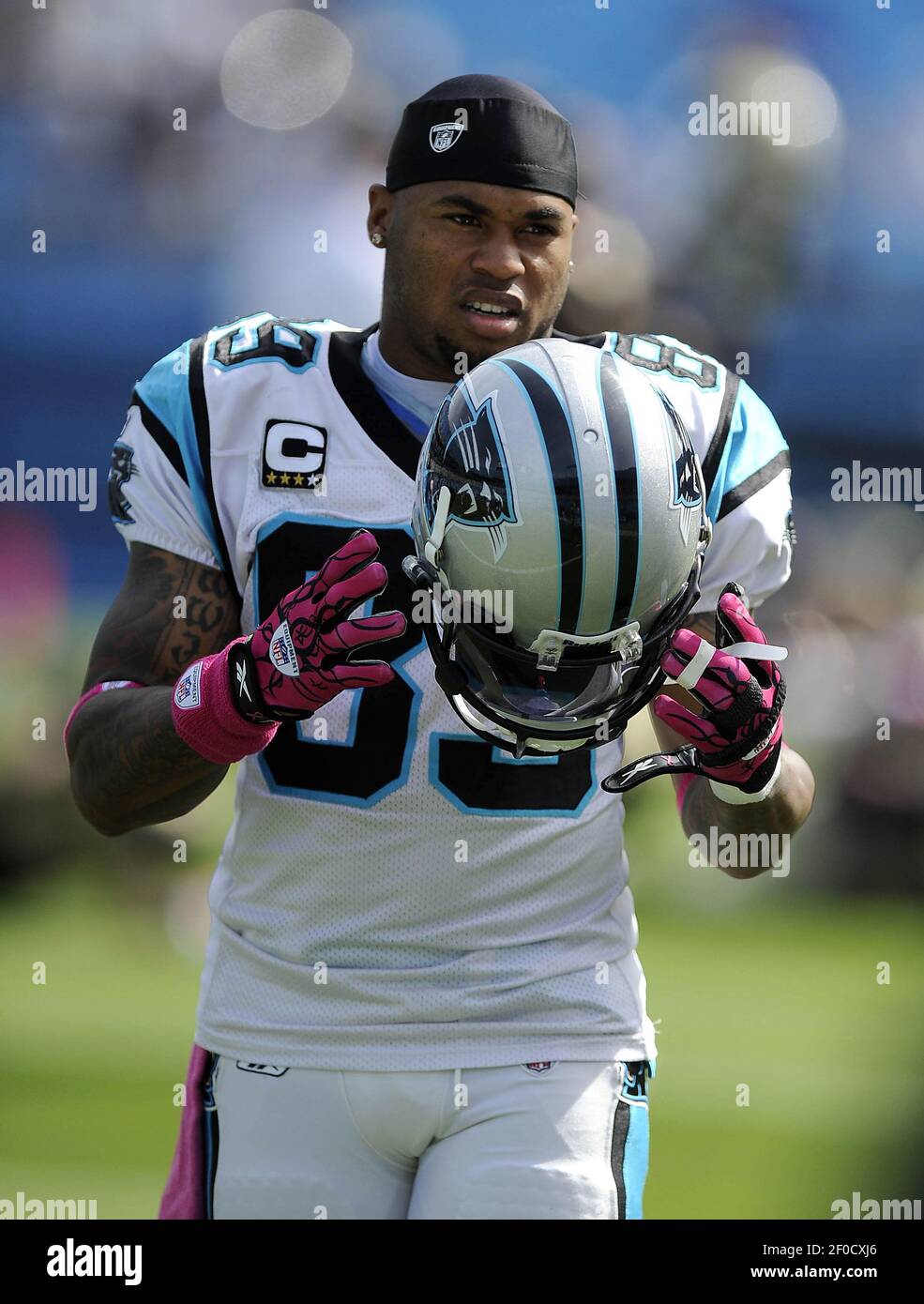 Carolina Panthers' Steve Smith (89) puts on his helmet during warm ups ...