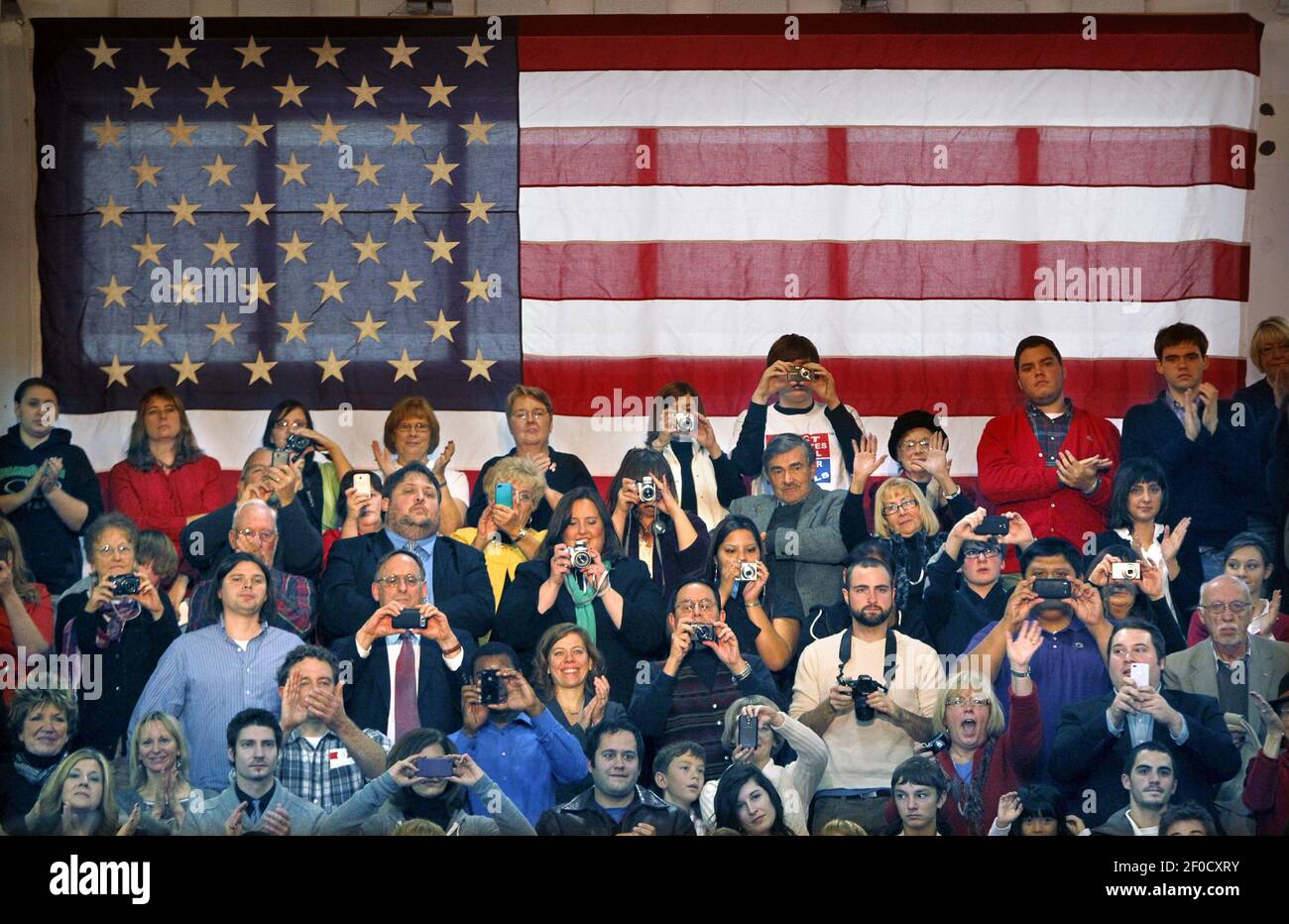 Attendees applaud amid President Barack Obama's visit to Osawatomie ...