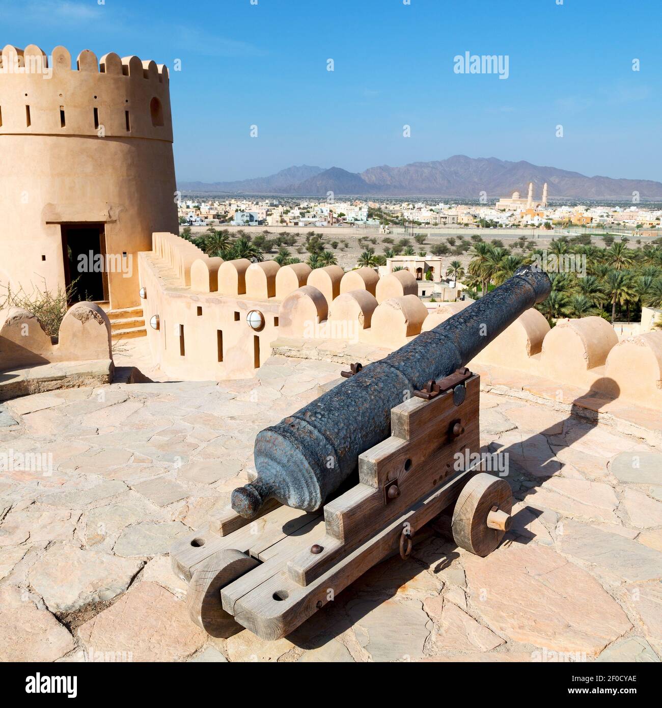 In oman muscat the old castle and cannon near the wall Stock Photo - Alamy