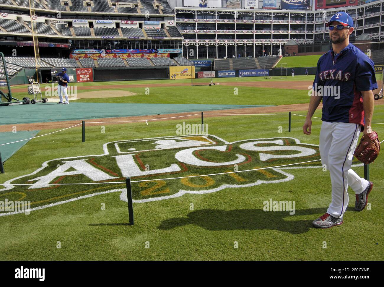 Texas Rangers designated hitter Michael Young (10) walks past the ALCS ...