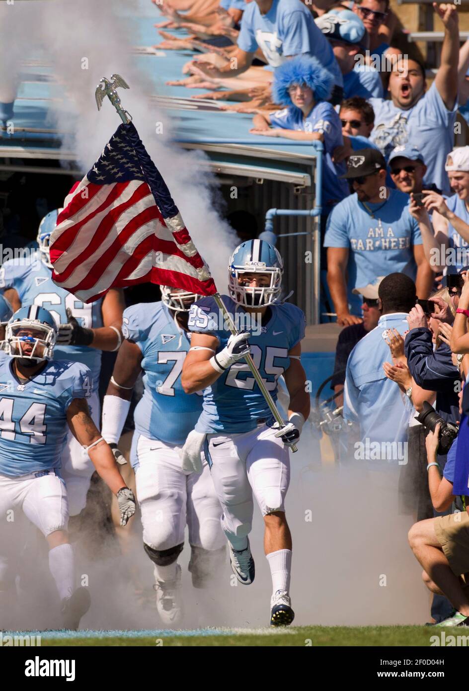 North Carolina's Matt Merletti (25) leads the Tar Heels into Kenan ...