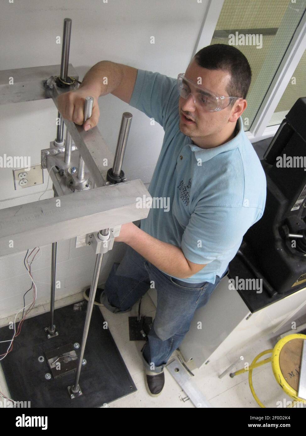 Ledjan Qato, an engineering graduate student at Villanova, tests a ...