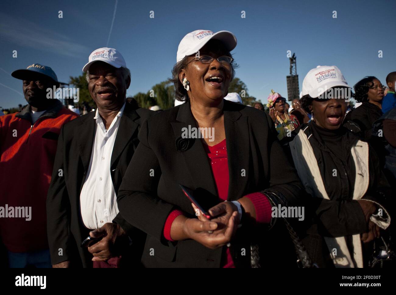 Michael Cobb, of Washington, DC, from left, Walter Council and his wife ...