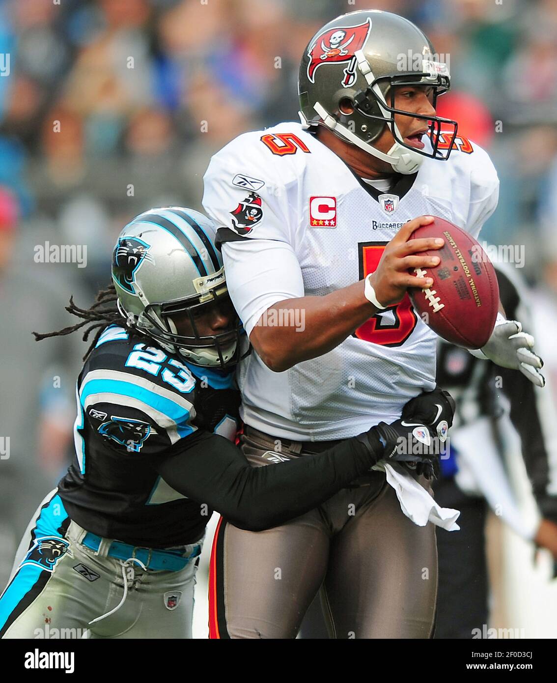 Carolina Panthers safety Sherrod Martin (23) wraps up Tampa Bay ...