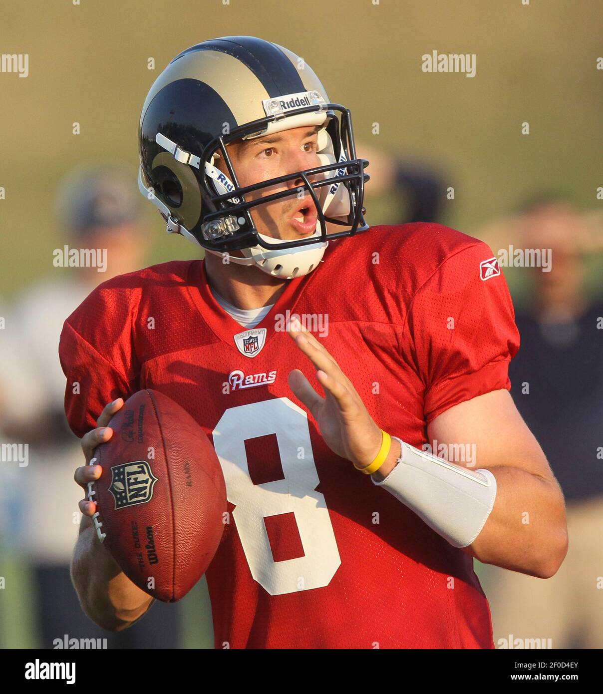 St. Louis Rams quarterback Sam Bradford looks to pass during training ...