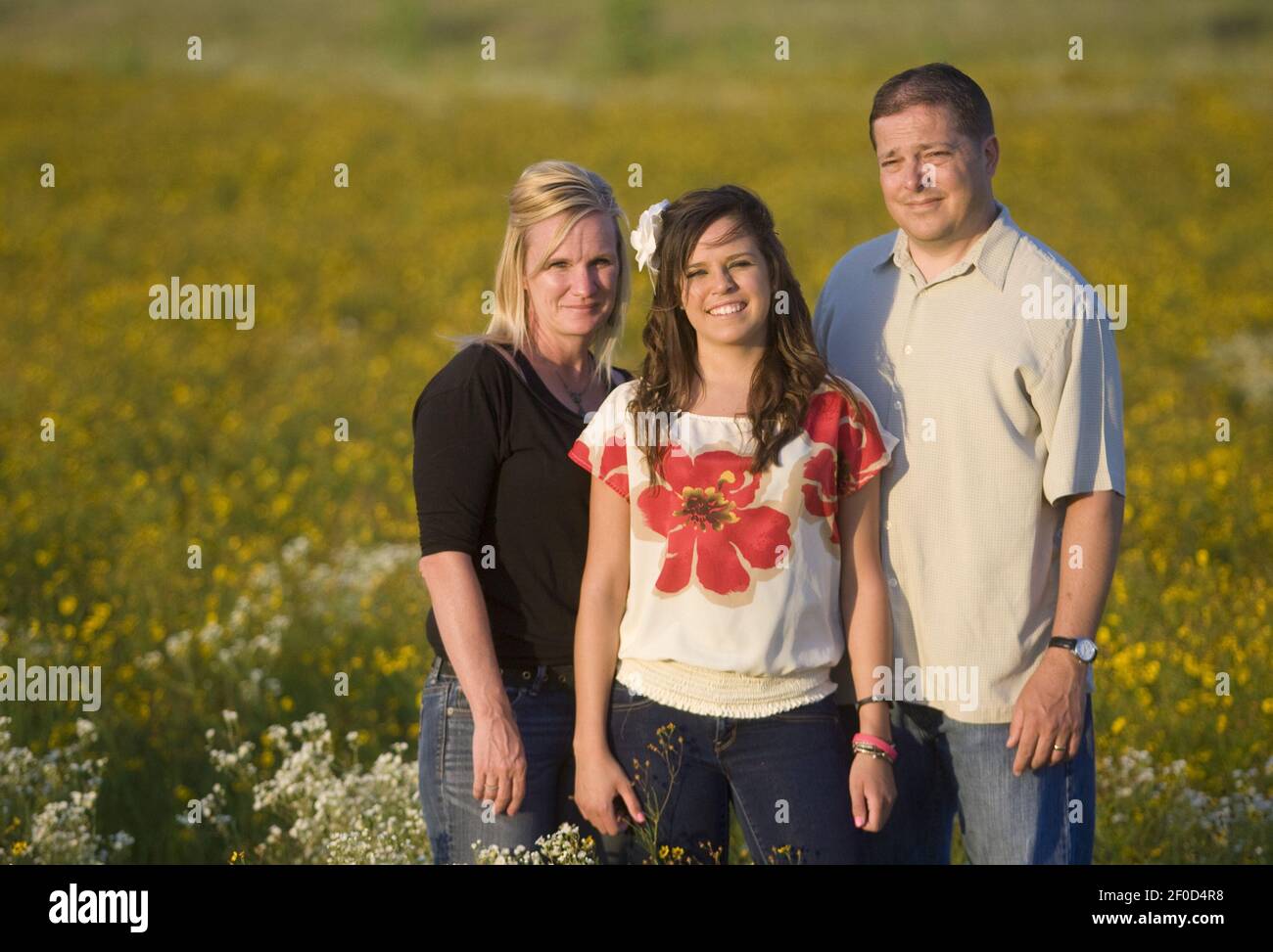 Melissa, left, and Shawn Gerleman, right, poses for portrait with their ...