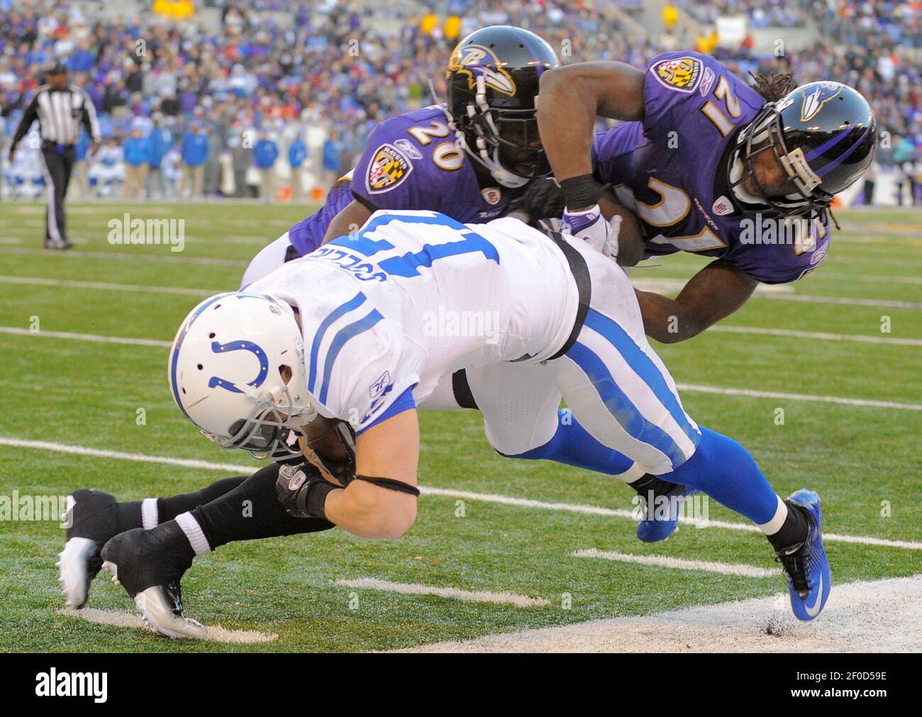 Indianapolis Colts wide receiver Austin Collie is forced out of bounds ...