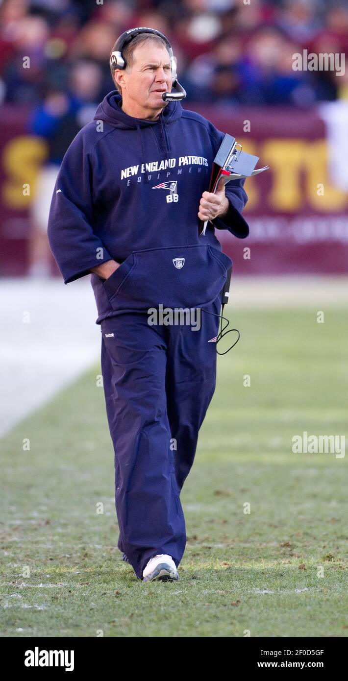New England Patriots Head Coach Bill Belichick stands on the field ...
