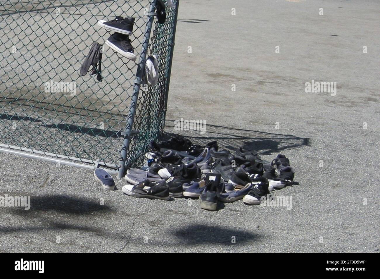 Detainee prison-issue shoes left at a soccer field during a media visit ...