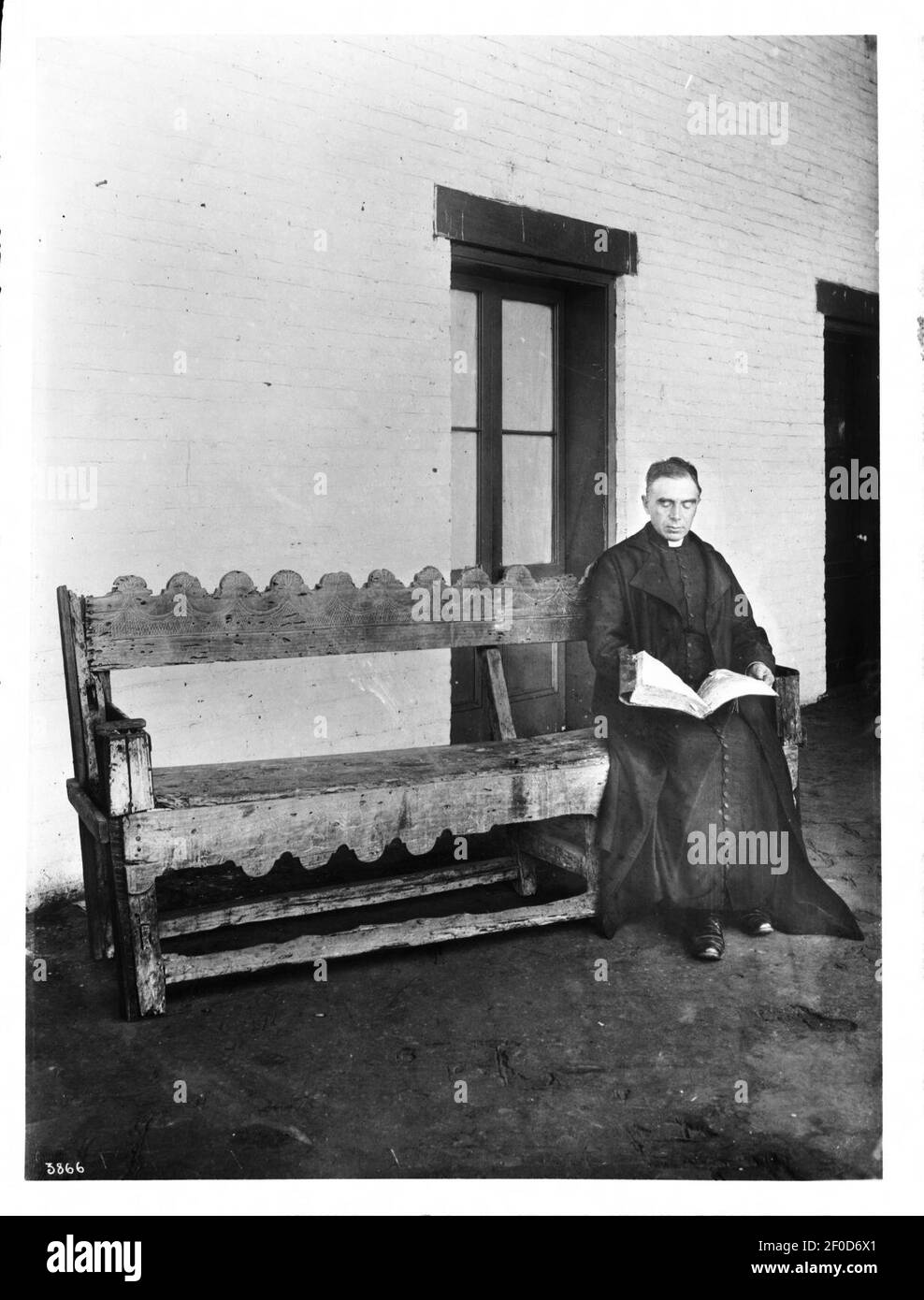 Plaza Church priest Reverend Joachim Adam, sitting on a bench, Los ...