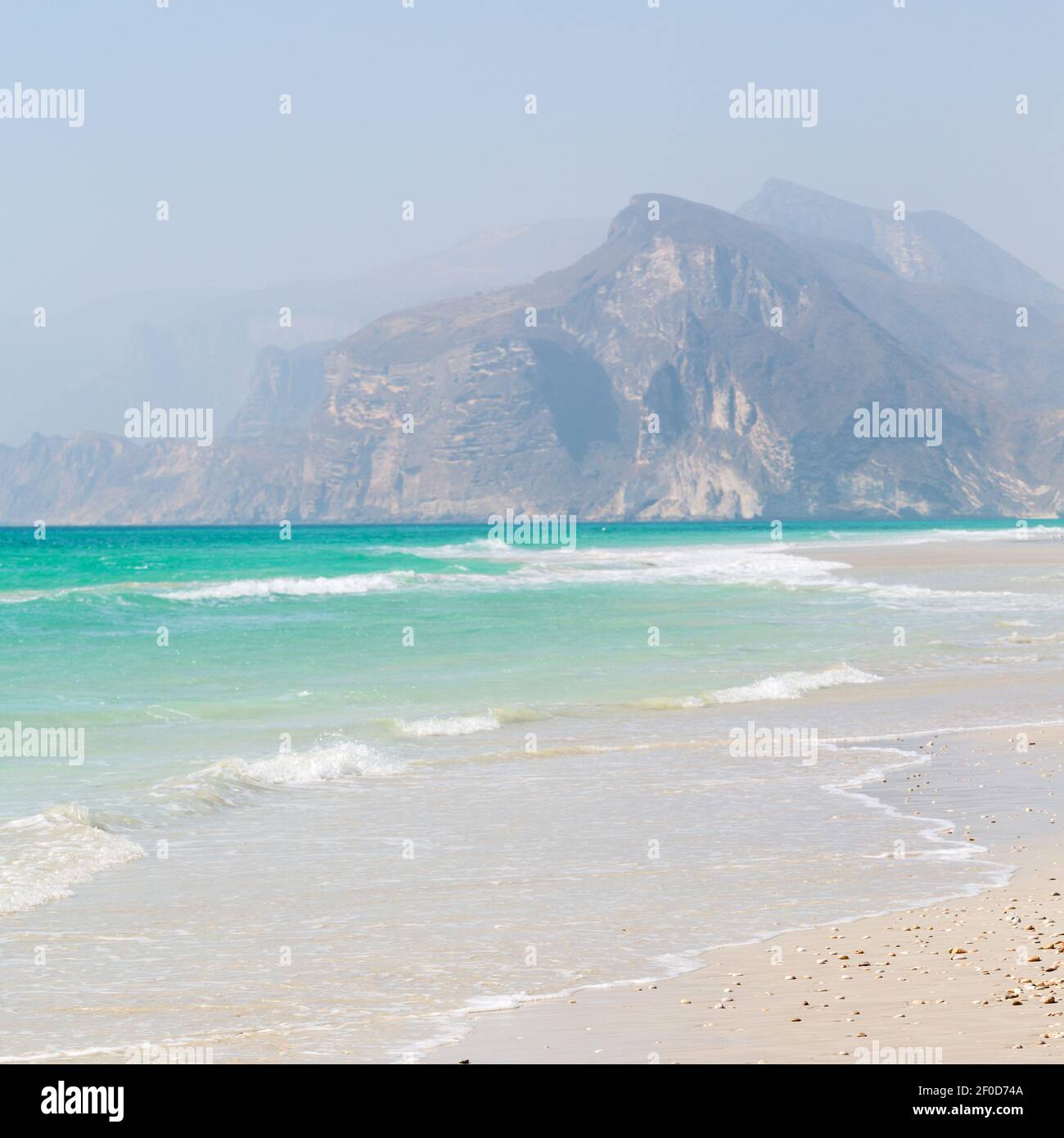 In oman arabic sea the hill near sandy beach sky and mountain Stock ...