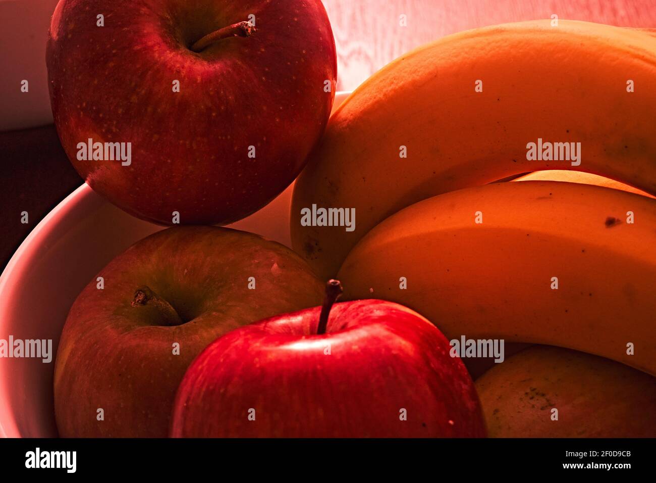 Apple banana fruit snack bowl Stock Photo - Alamy
